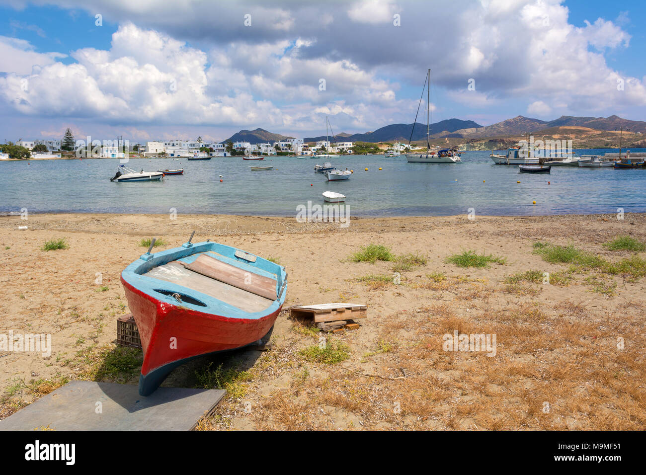 Boat on beach in Pollonia village. Milos island, Greece Stock Photo - Alamy