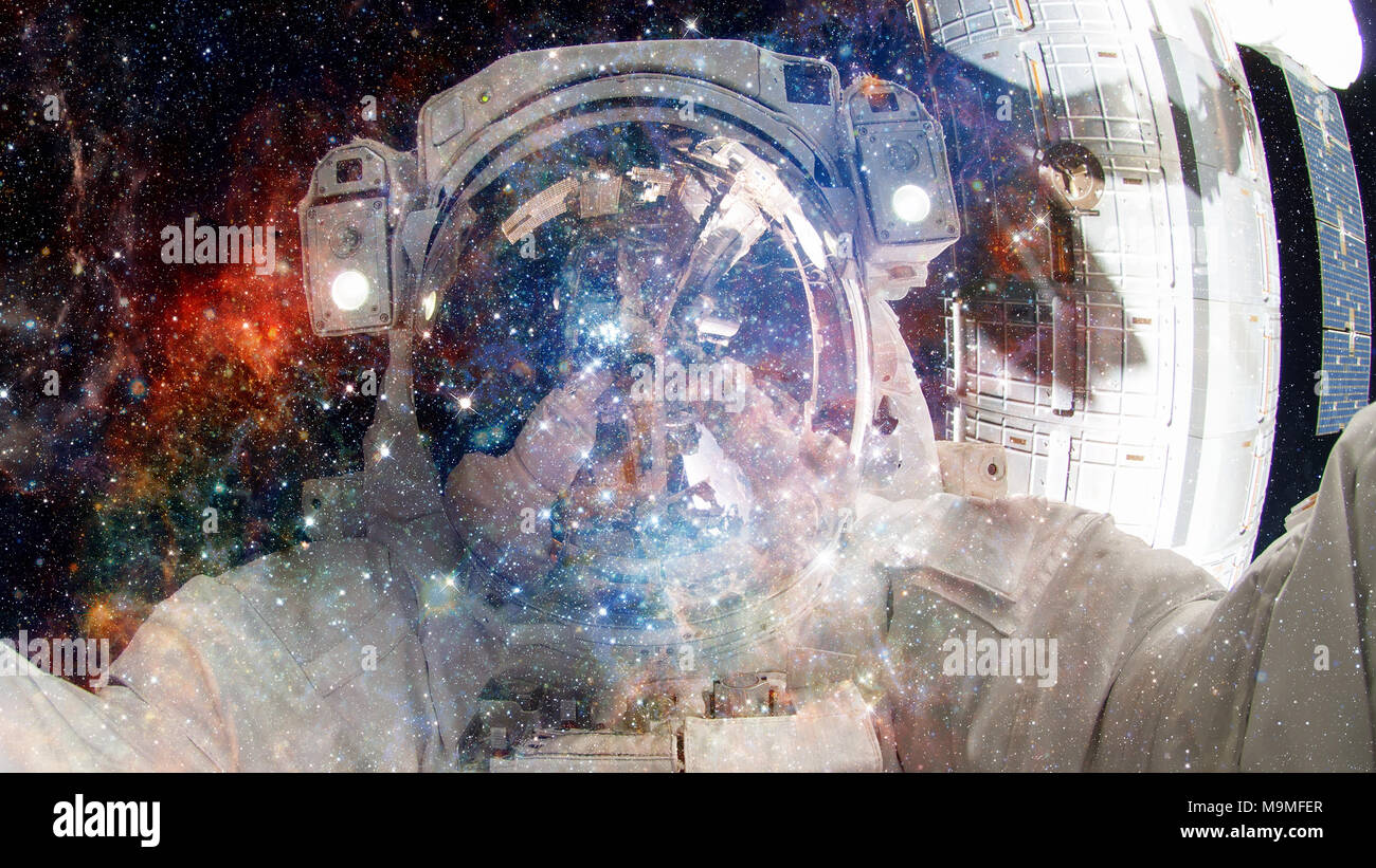 Astronaut in outer space. Science fiction art. Elements of this image ...