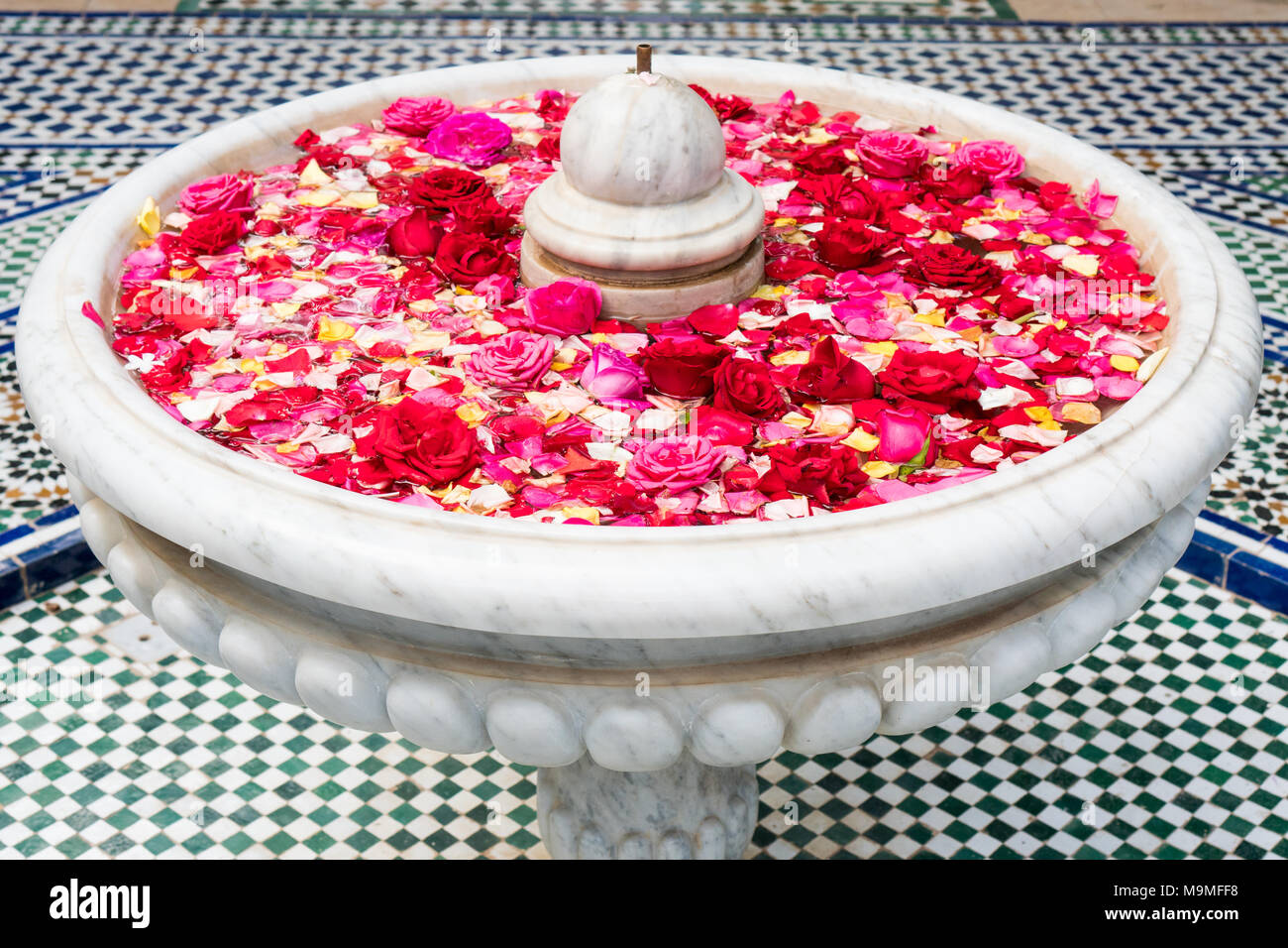 Romantic floral decoration with red and pink roses floating in a ...