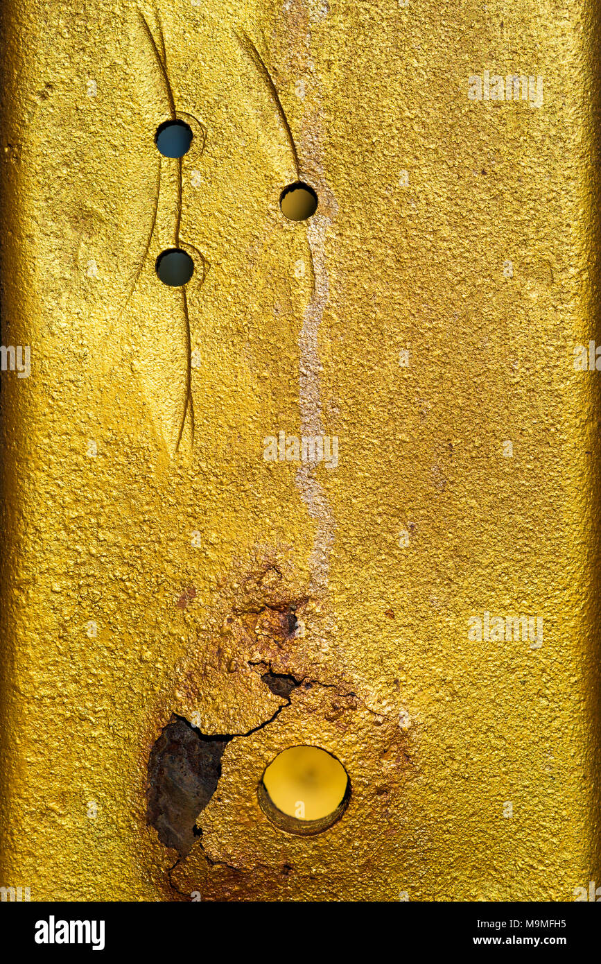 Golden colored rusty metal detail used for construction Stock Photo - Alamy