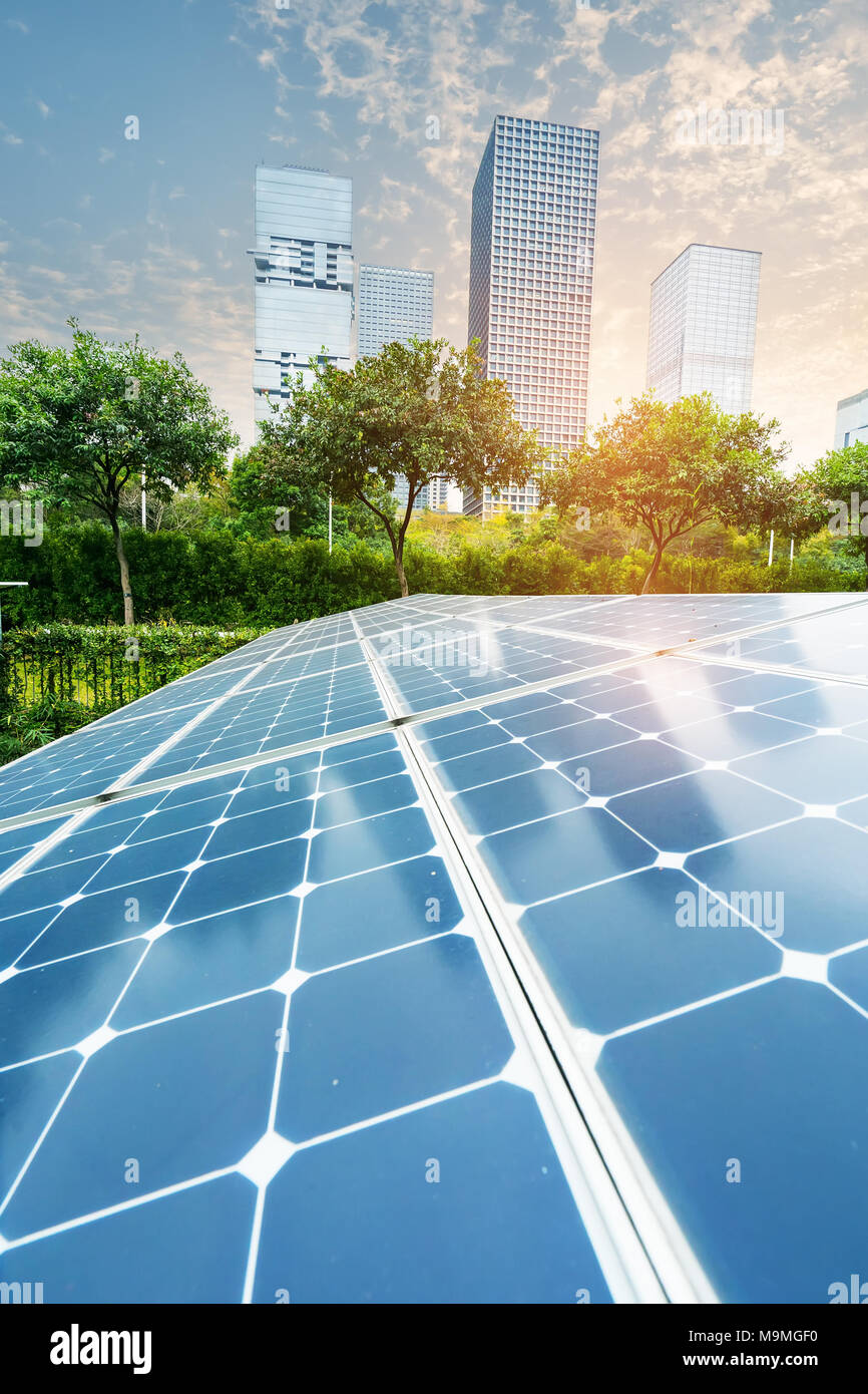 solar panel plant with urban landscape landmarks,Ecological energy ...