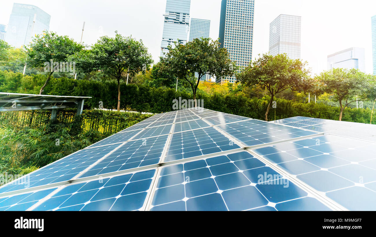 solar panel plant with urban landscape landmarks,Ecological energy ...