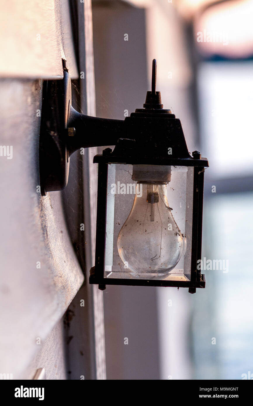 Outdated patio lighting Stock Photo - Alamy