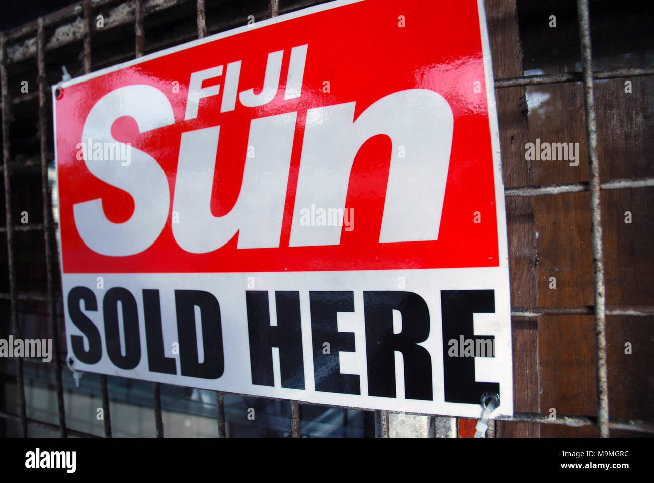 Fiji sun newspaper sold here sign hi-res stock photography and images ...