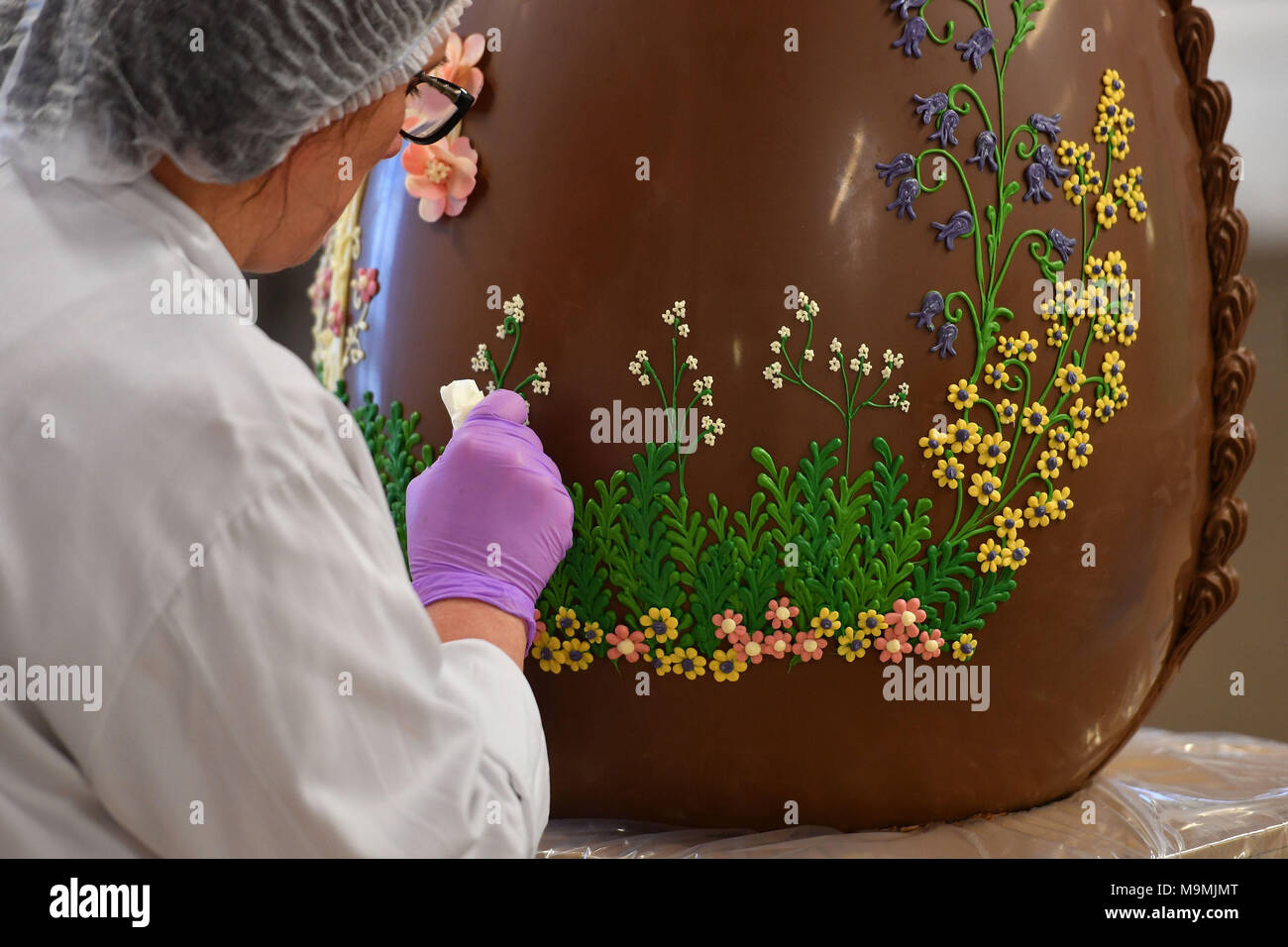 STANDALONE IMAGE Chocolatier Dawn Jenks decorates a giant chocolate egg ...