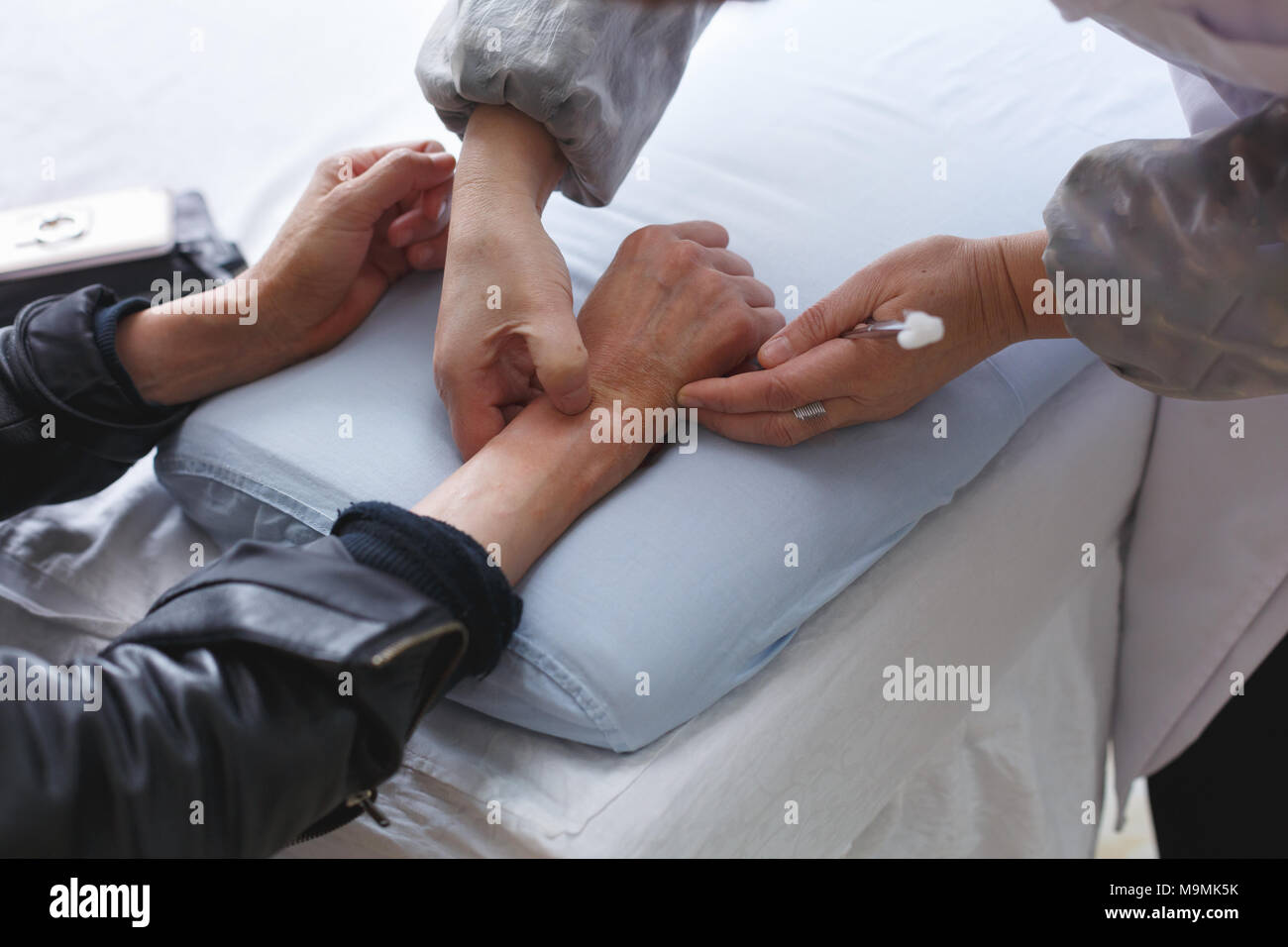 Wrist acupuncture hi-res stock photography and images - Alamy