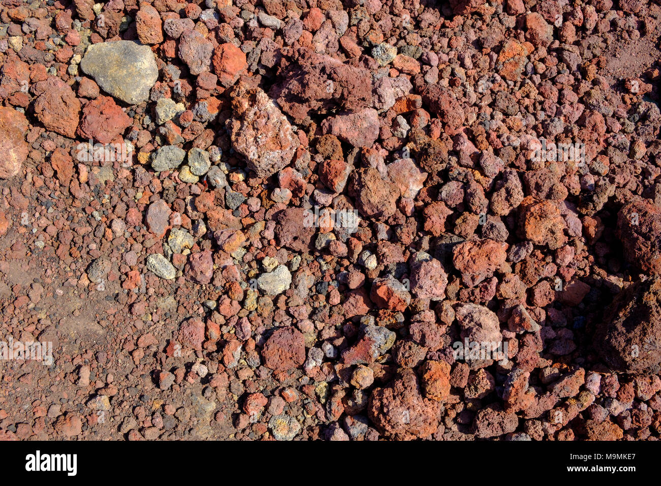 Red lava stones, volcanic earth, Silvestri crater, Etna volcano ...