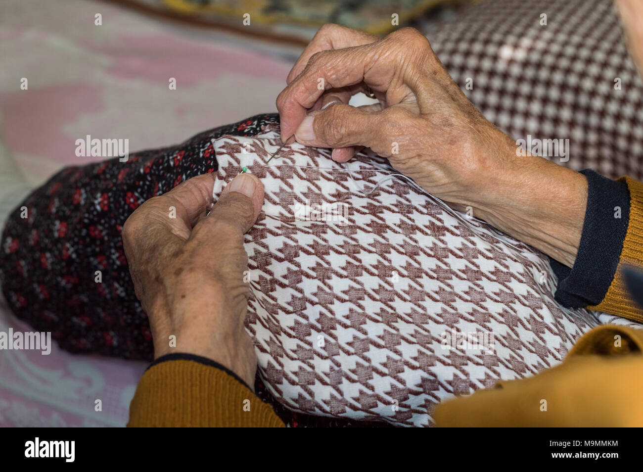Woman Hand Sewing