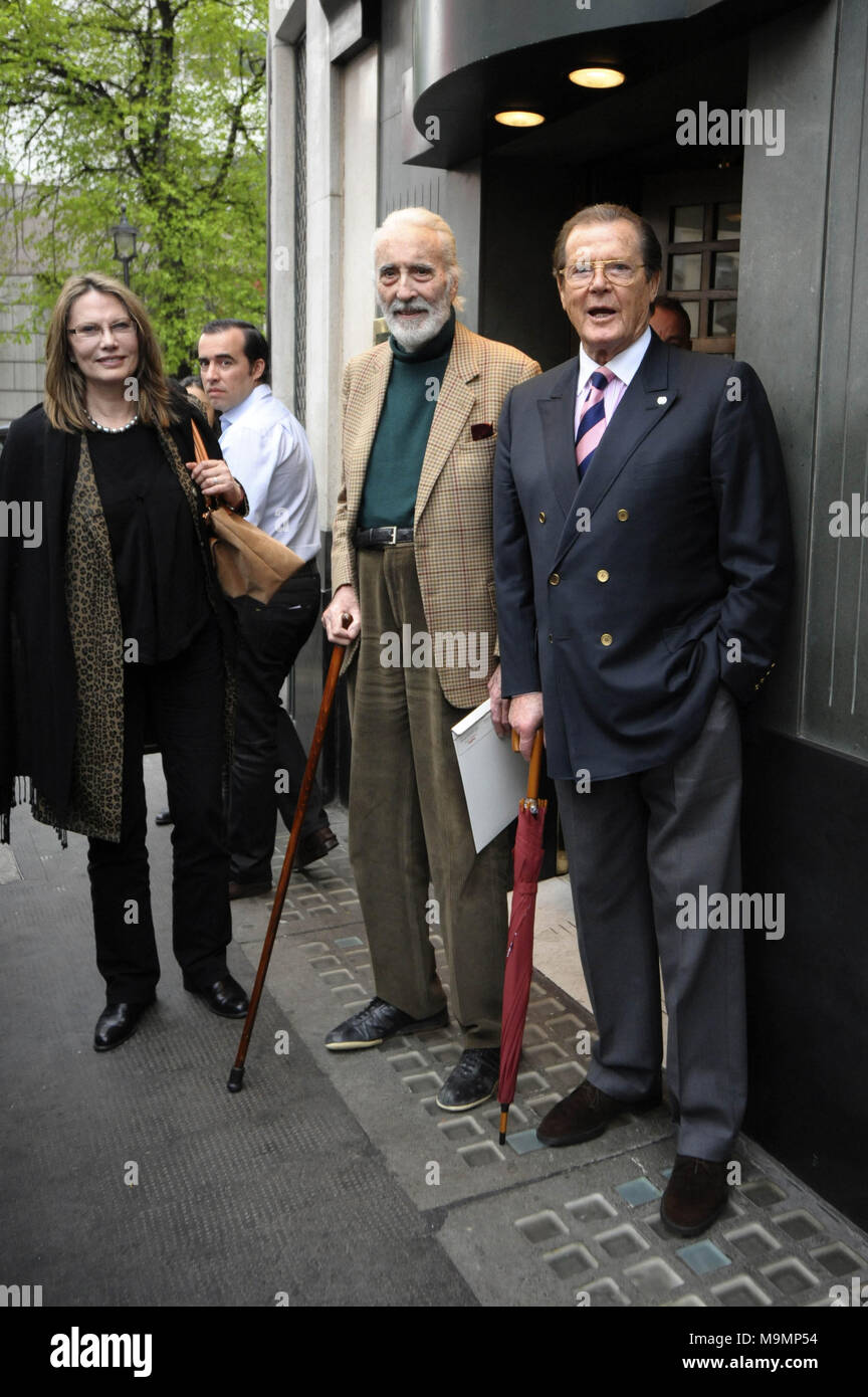LONDON, ENGLAND - APRIL 26: Sir Christopher Lee, Sir Rodger Moore ...