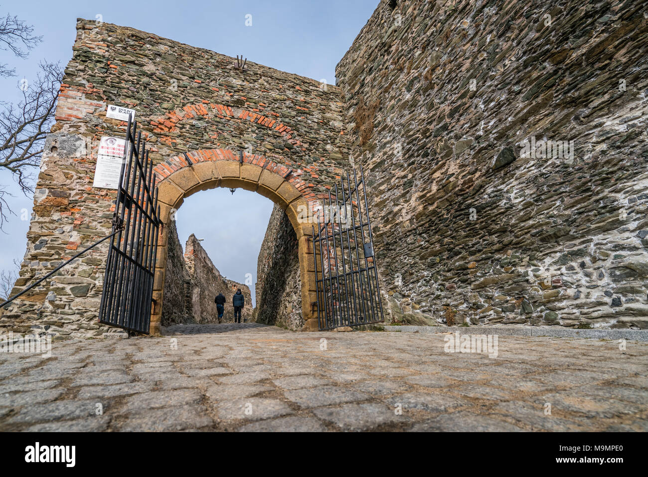 Bolkow, Poland - February 2018 : Tourists walking through gates of the ...