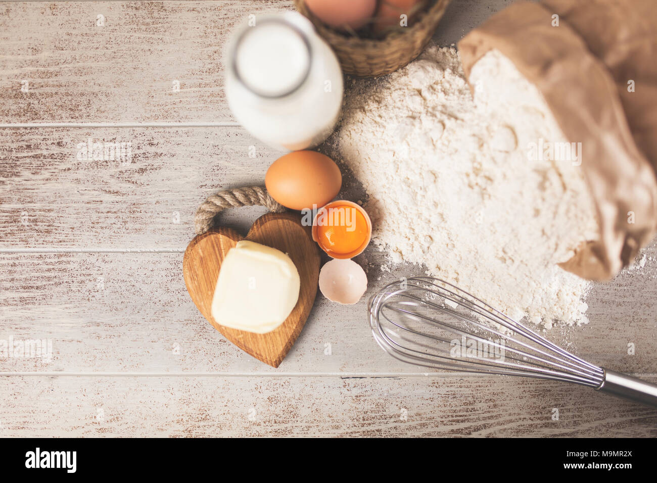Basic baking ingredients eggs hi-res stock photography and images - Alamy