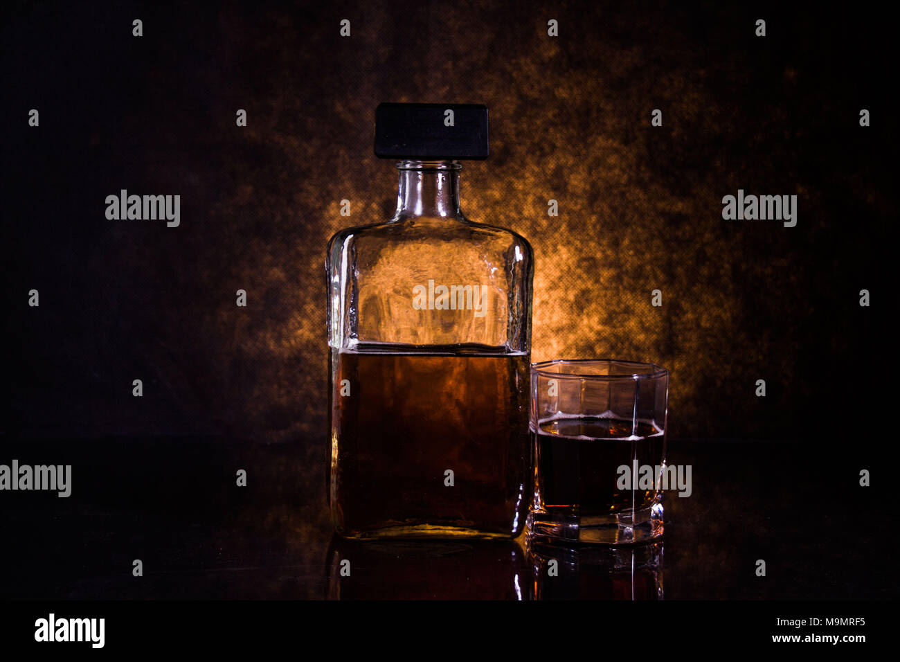 Alcohol Drink in a bottle and Glass, say cheers Stock Photo - Alamy