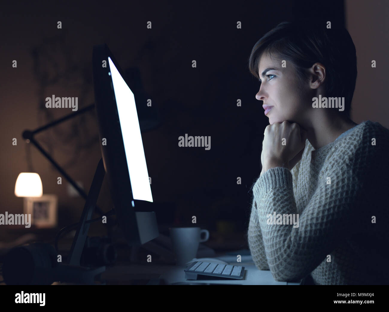 Watching computer screen hi-res stock photography and images - Alamy