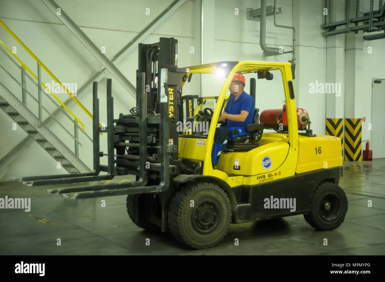 Tobolsk, Russia - July 15. 2016: Sibur company. Polymer plant. Driver ...