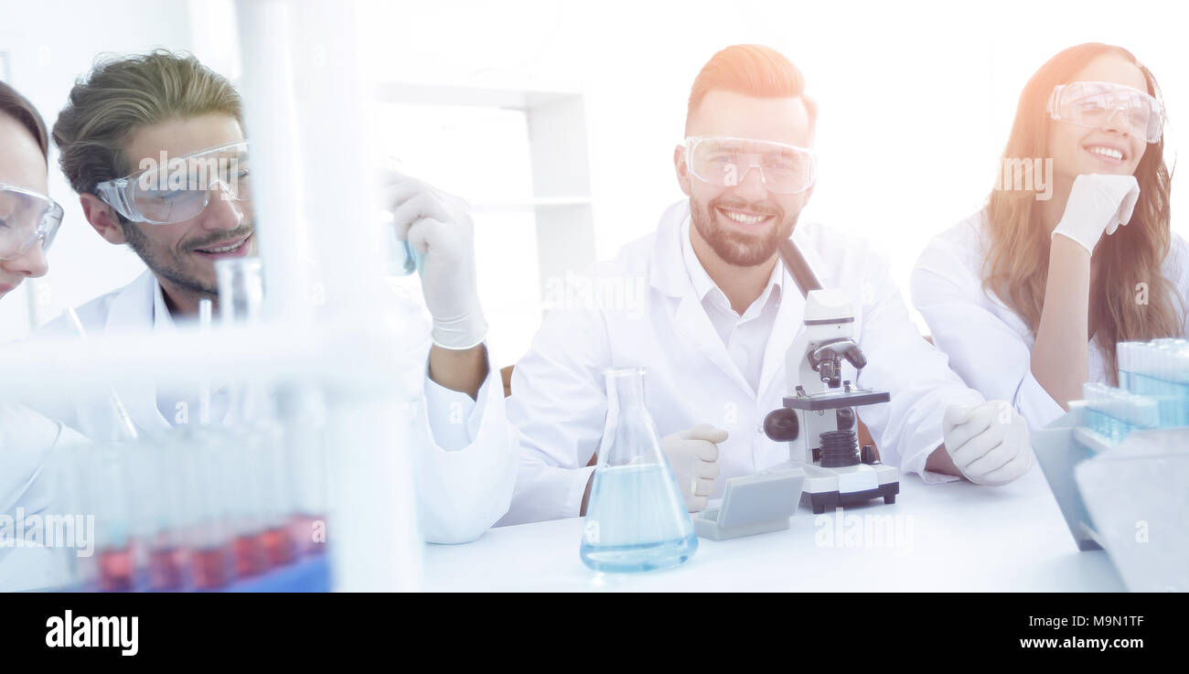background image is a group of scientists microbiologists Stock Photo ...