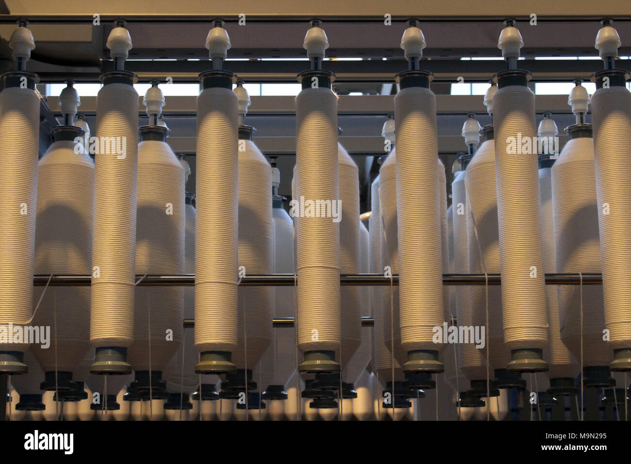 Textile machines producing cloth hi-res stock photography and images ...