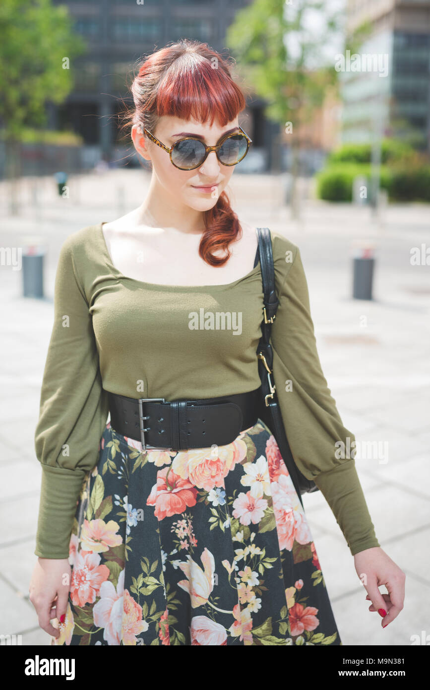 portrait young woman beautiful posing outdoor looking down - attitude ...