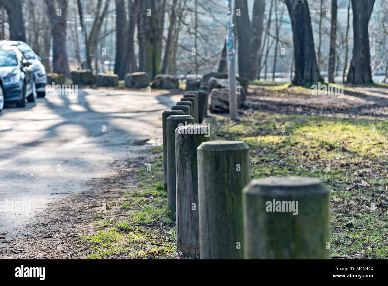 Old wood pillars on the roadside Stock Photo - Alamy