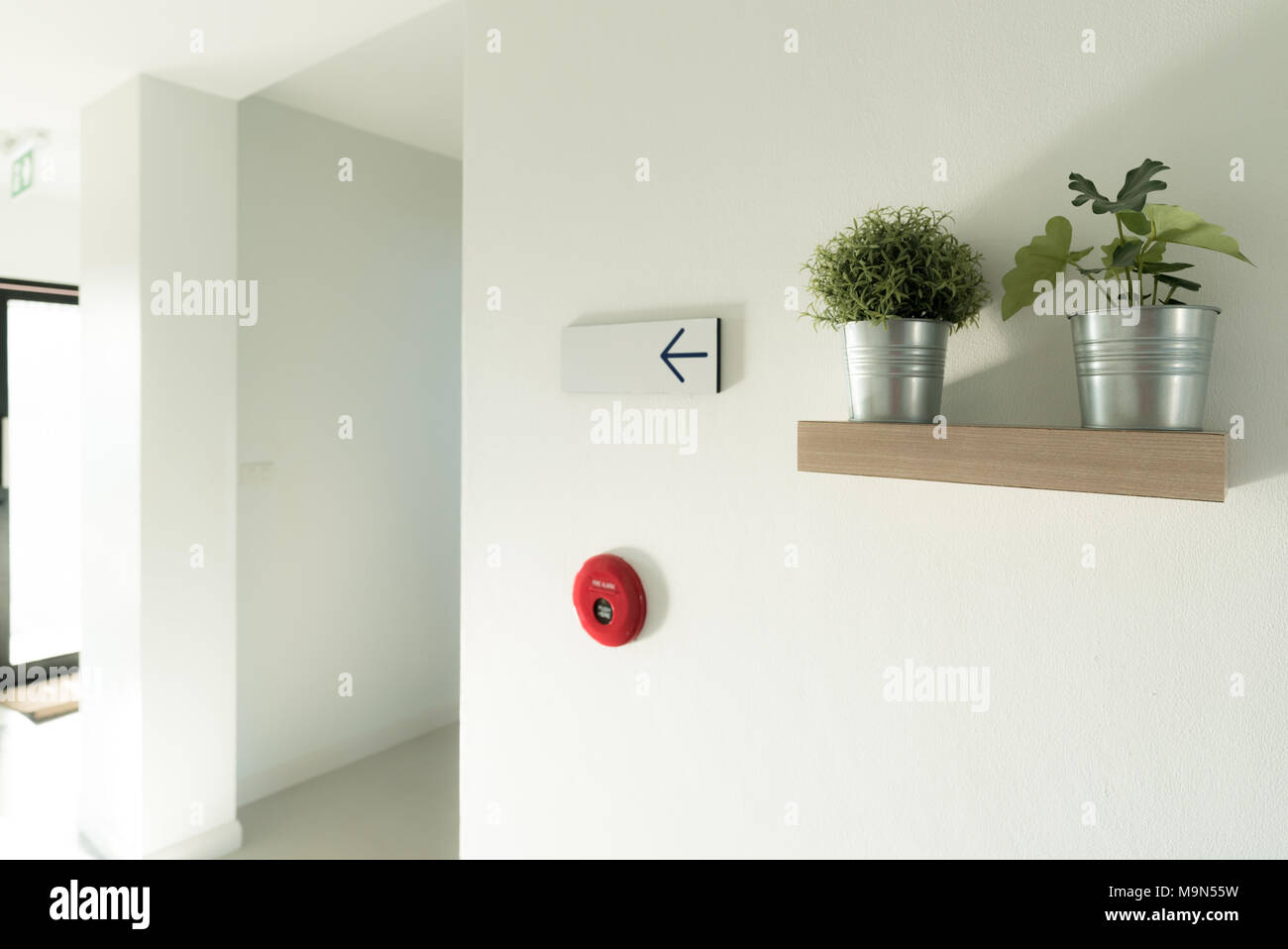 Hotel Corridor with Fire exit in background Stock Photo - Alamy