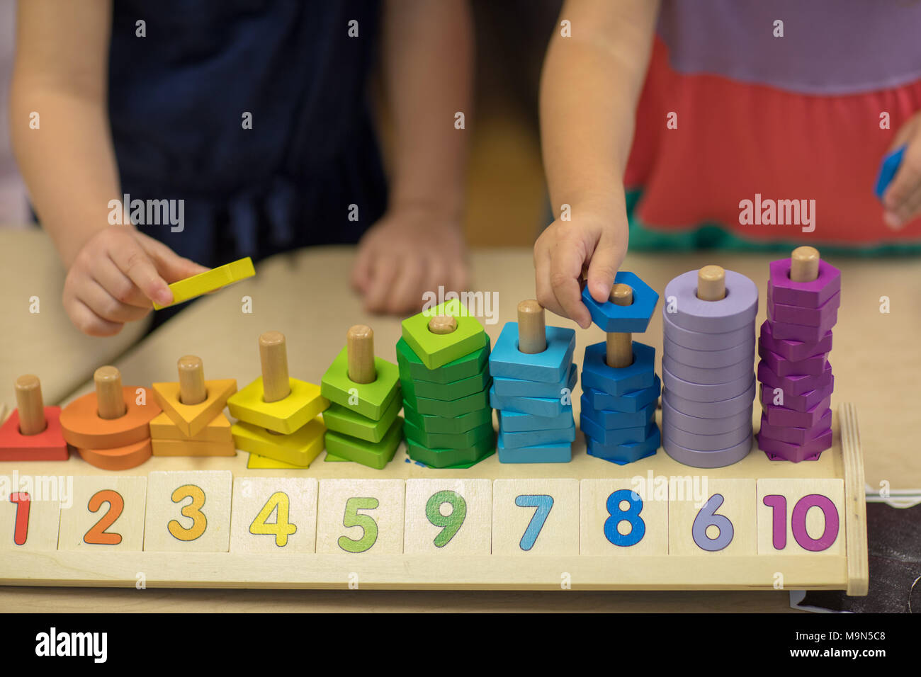 Stacking wooden shapes hi-res stock photography and images - Alamy