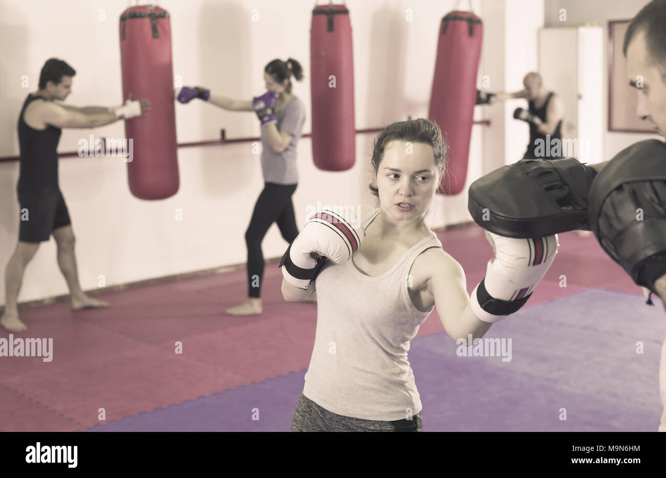 Young athlete girl training boxing sparring at box class Stock Photo ...