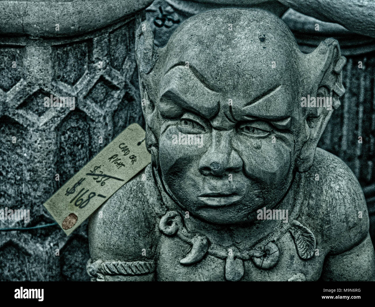 Stone statue of little orc Stock Photo - Alamy