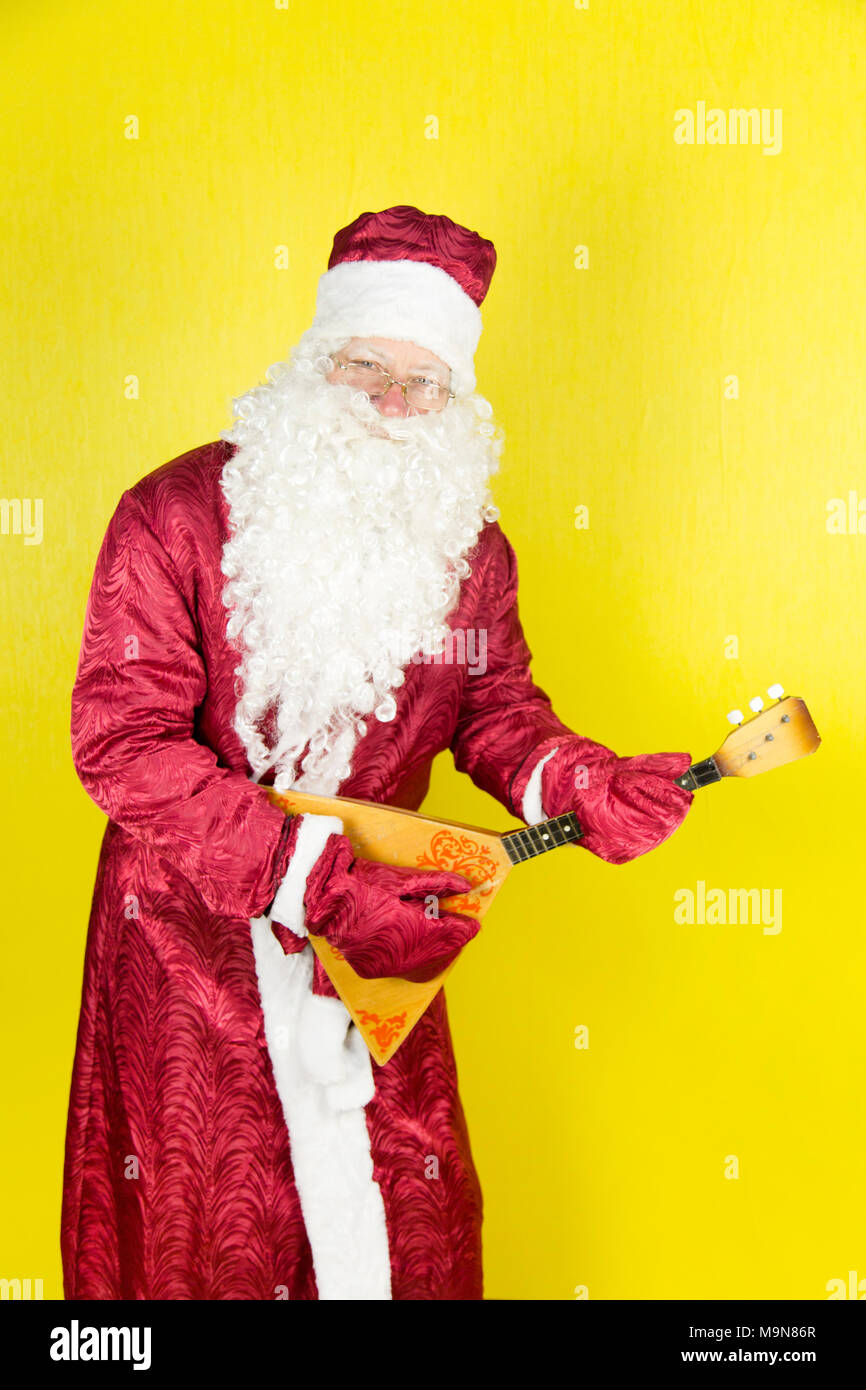 Santa claus playing instrument hi-res stock photography and images - Alamy