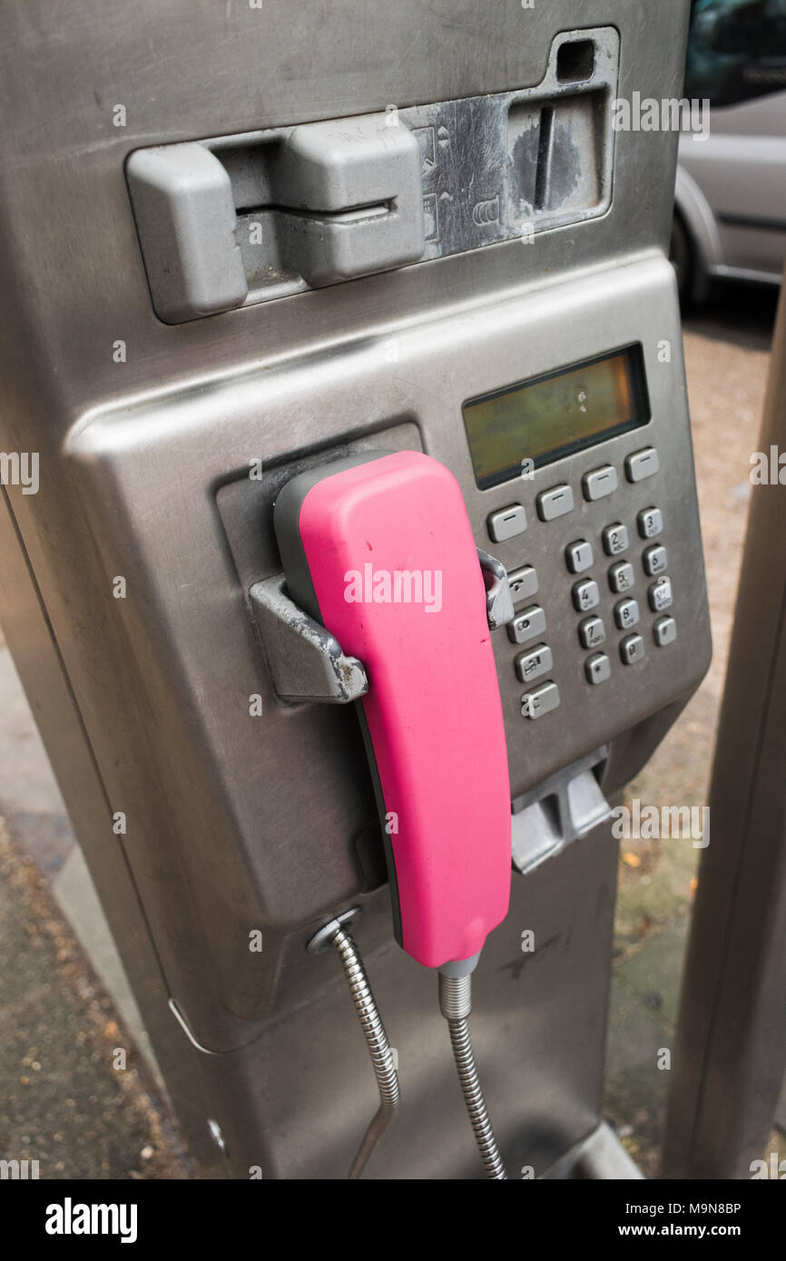Stationary open telephone box Stock Photo - Alamy