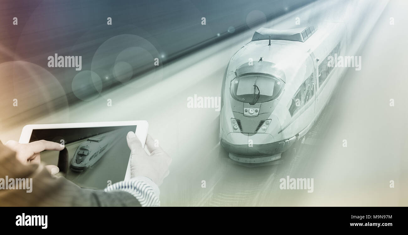 Woman touching tablet screen on background of moving high speed train ...