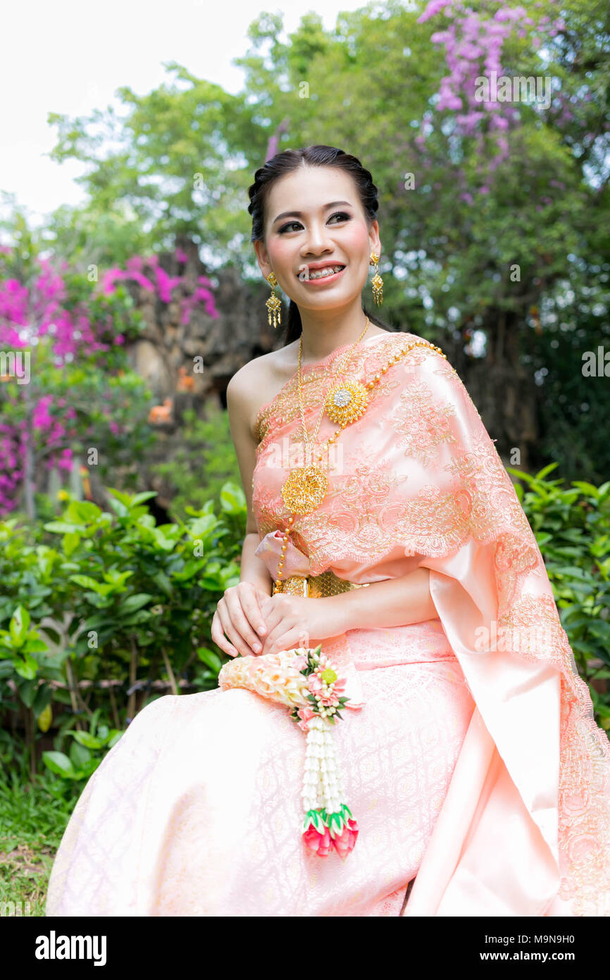 Women in a beautiful traditional thai clothing Stock Photo - Alamy