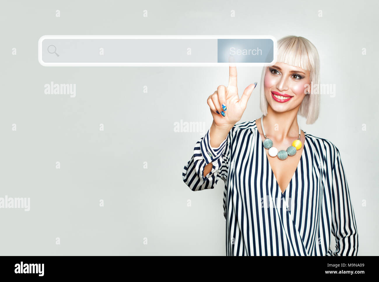 Happy Blonde Woman Surfing on Internet. Female Model with Empty Address ...