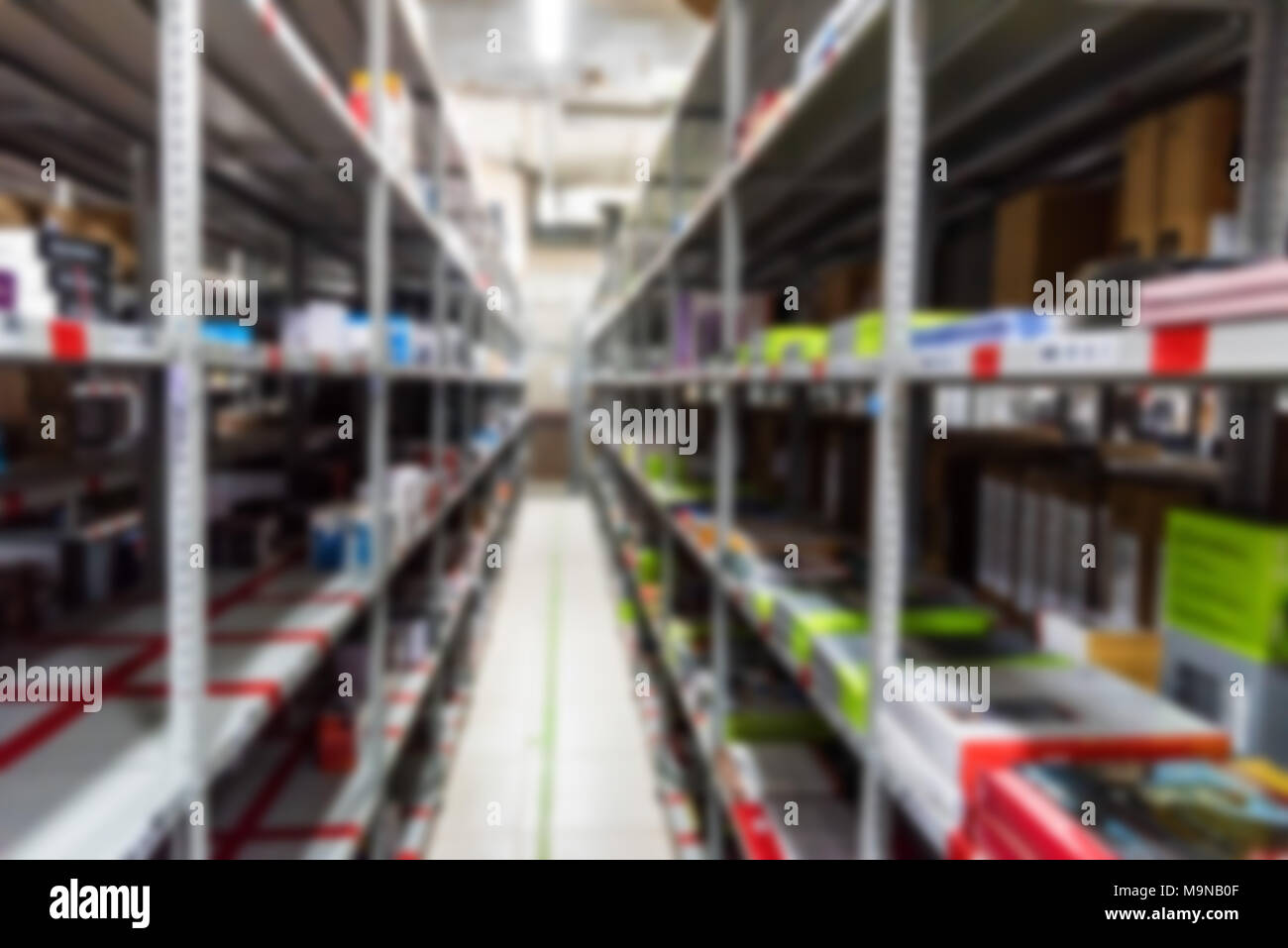 Blurred interior of hardware shop storage Stock Photo - Alamy
