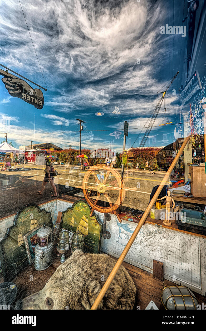 Reflection in marine supply store window Stock Photo - Alamy