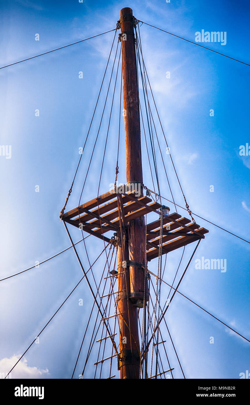 Wooden ship mast against blue sky Stock Photo - Alamy