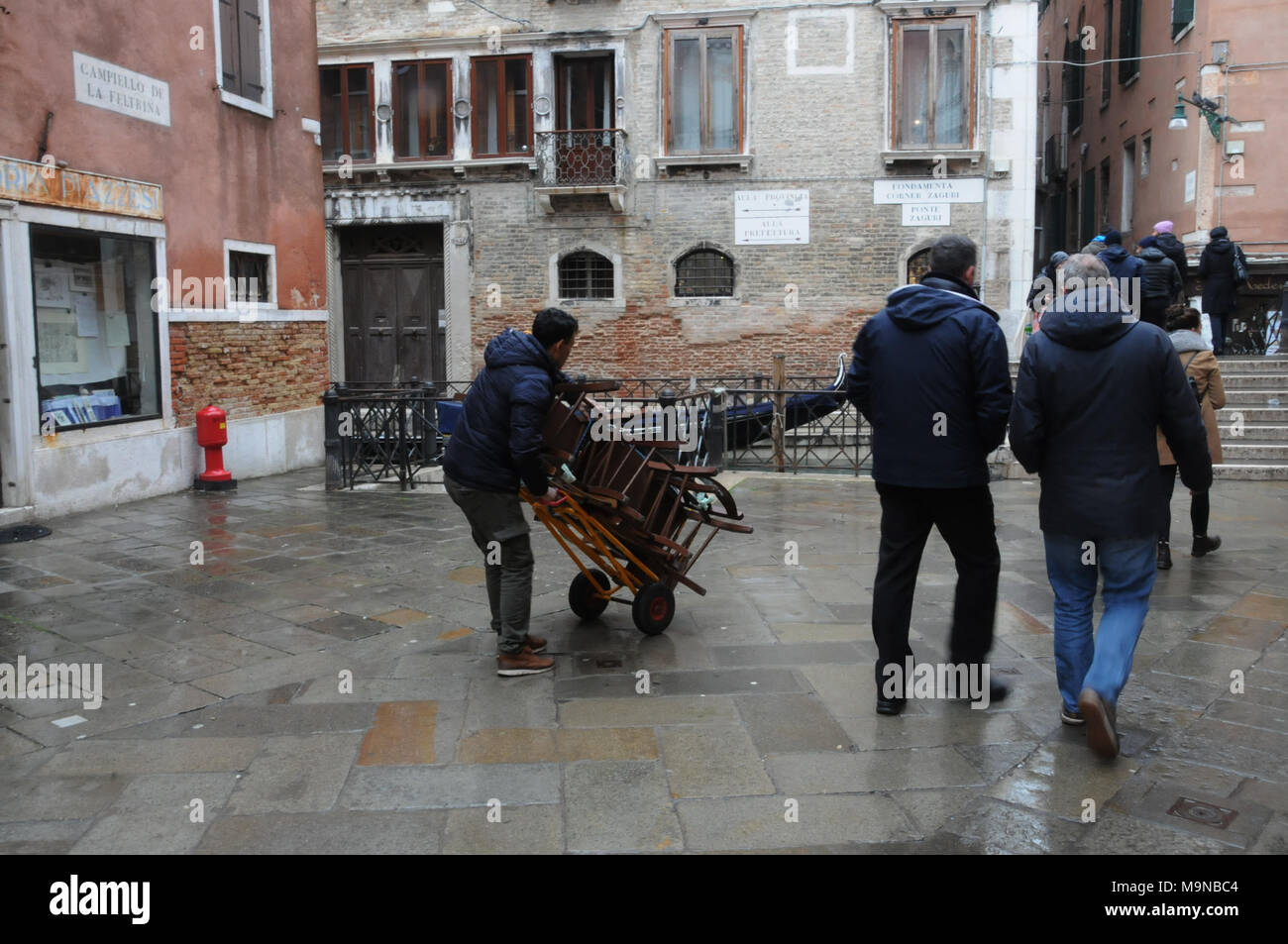 Workers in Venice, Italy Stock Photo - Alamy