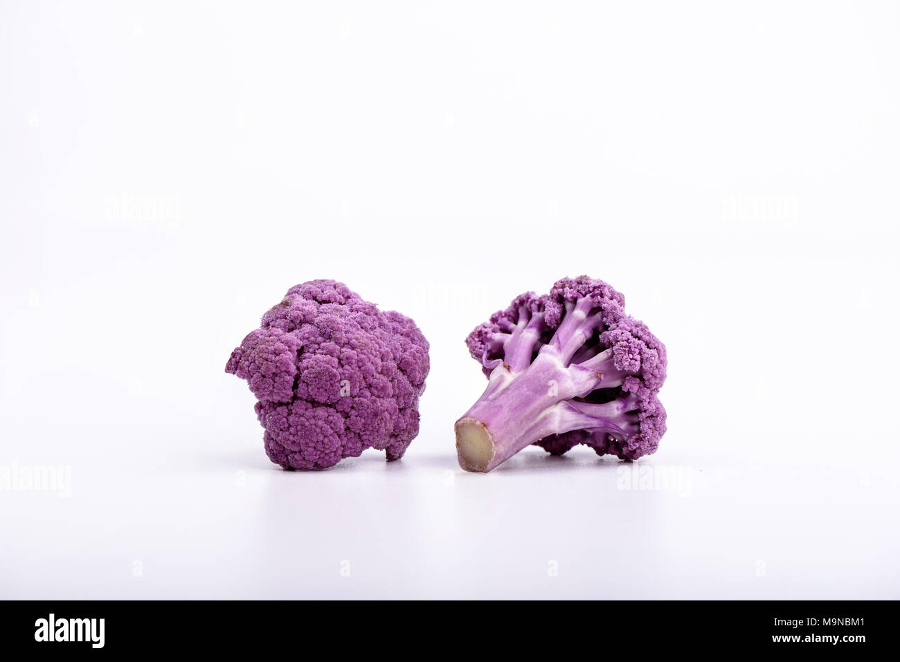 Violet cauliflower inflorescence isolated on white background Stock ...