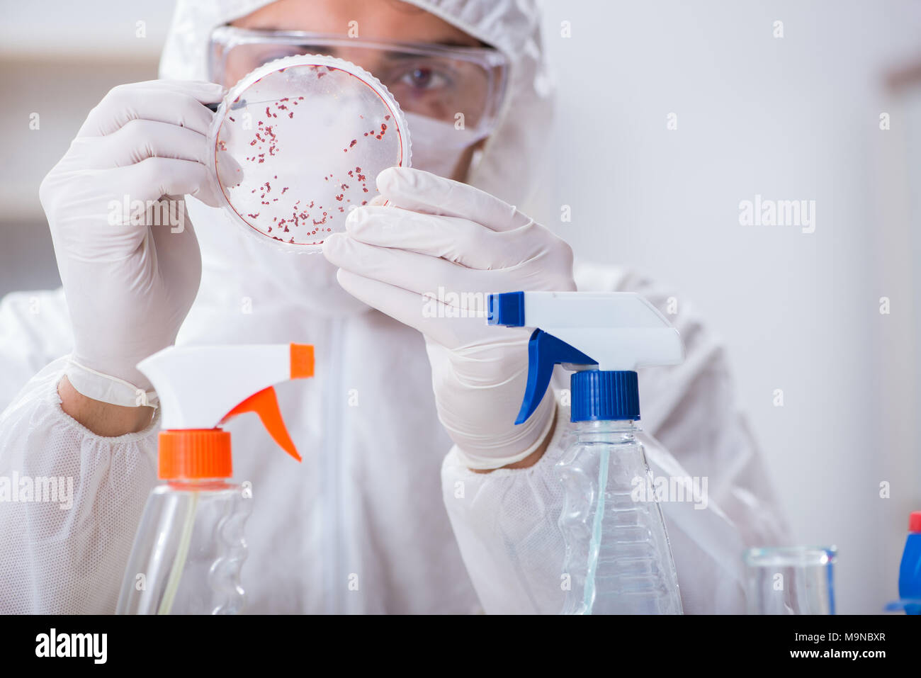 Chemist testing chemical substances in lab Stock Photo - Alamy
