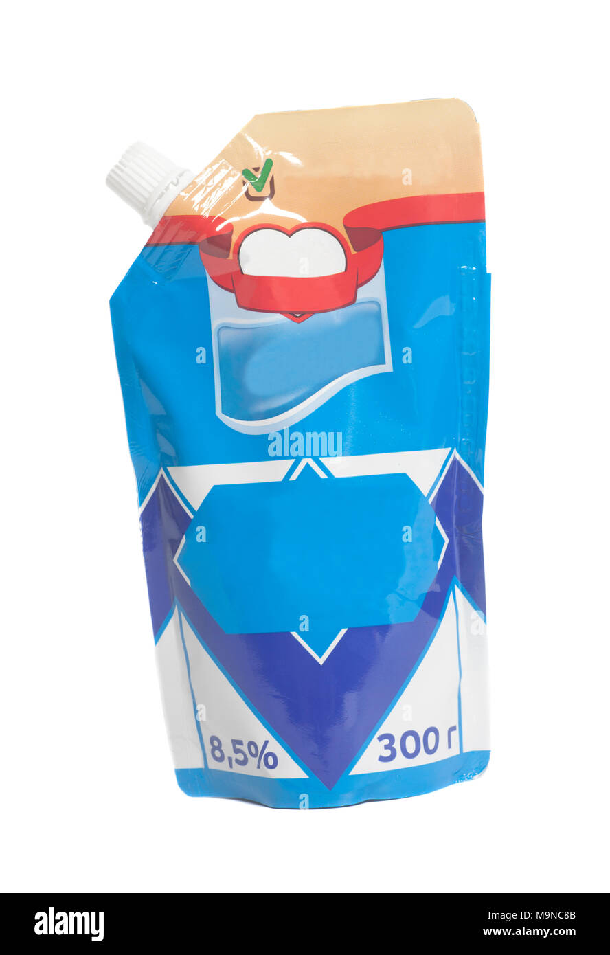 Blue packaging condenced milk isolated white background Stock Photo - Alamy