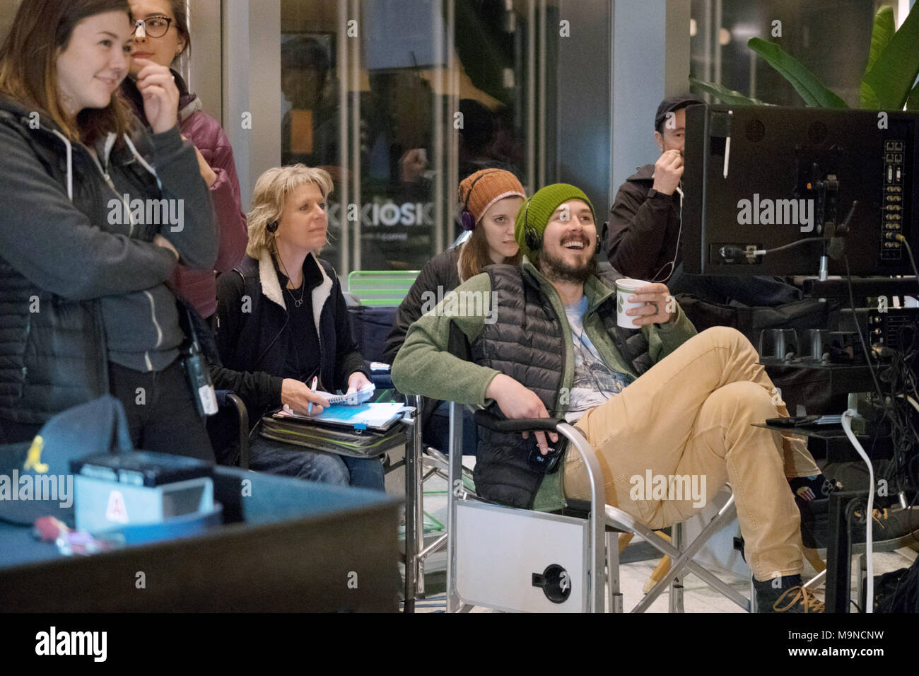 GAME OVER, MAN!, director Kyle Newacheck (right), on set, 2018. ph: Cate Cameron /© Netflix ...