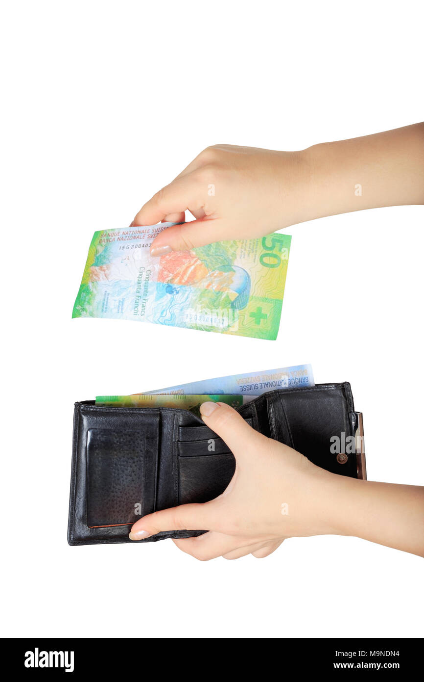 The Woman Pulls Out Fifty Swiss Francs From Her Purse Isolated On White the-woman-pulls-out-fifty-swiss-francs-from-her-purse-isolated-on-white