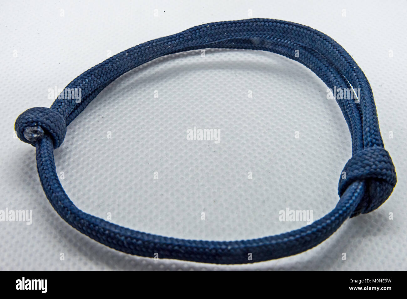 Bangle made of blue cord Stock Photo - Alamy