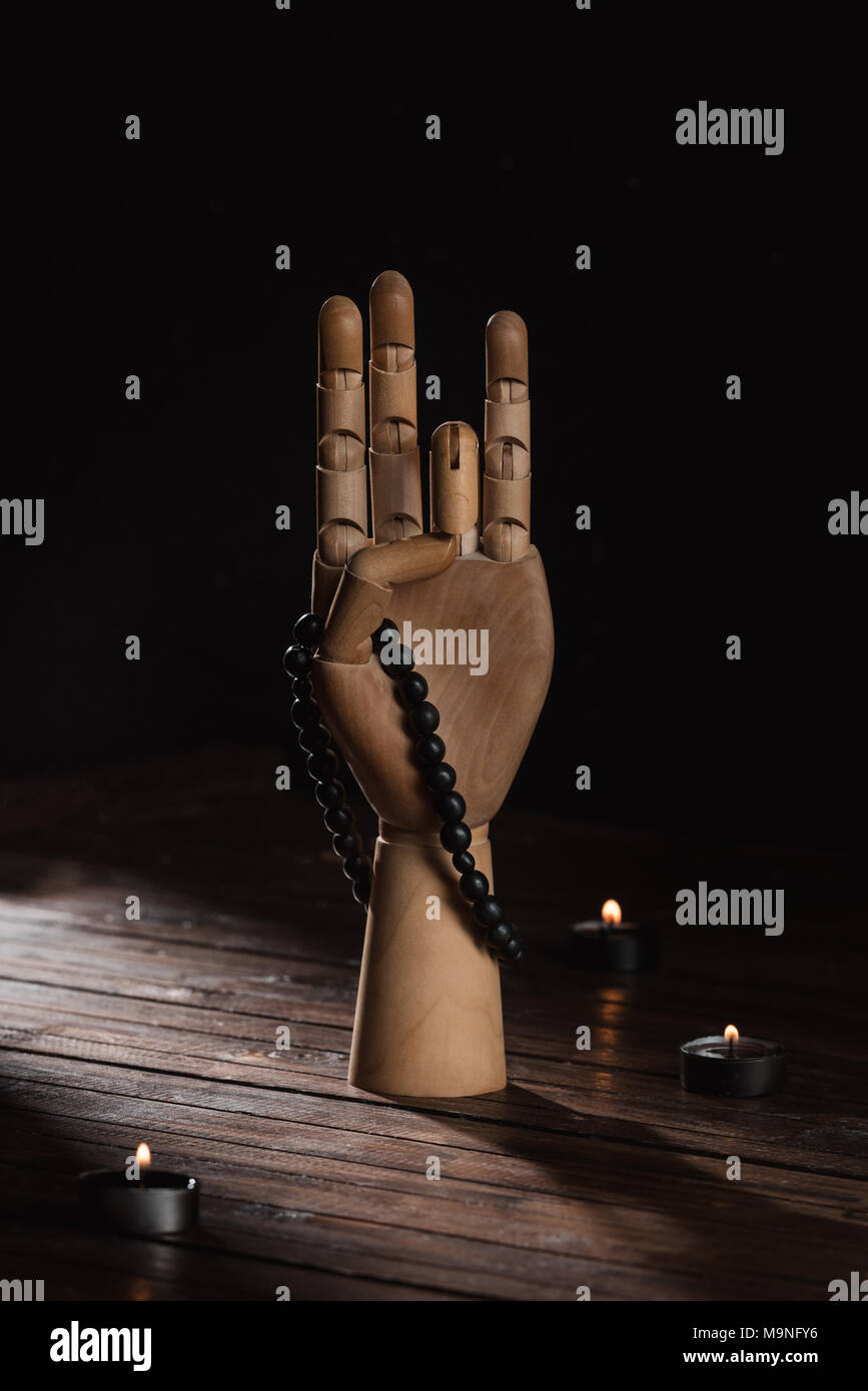 wooden hand with prithvi mudra gesture Stock Photo - Alamy