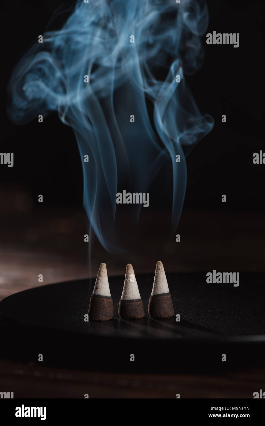 Incense sticks smoke on black hi-res stock photography and images - Alamy