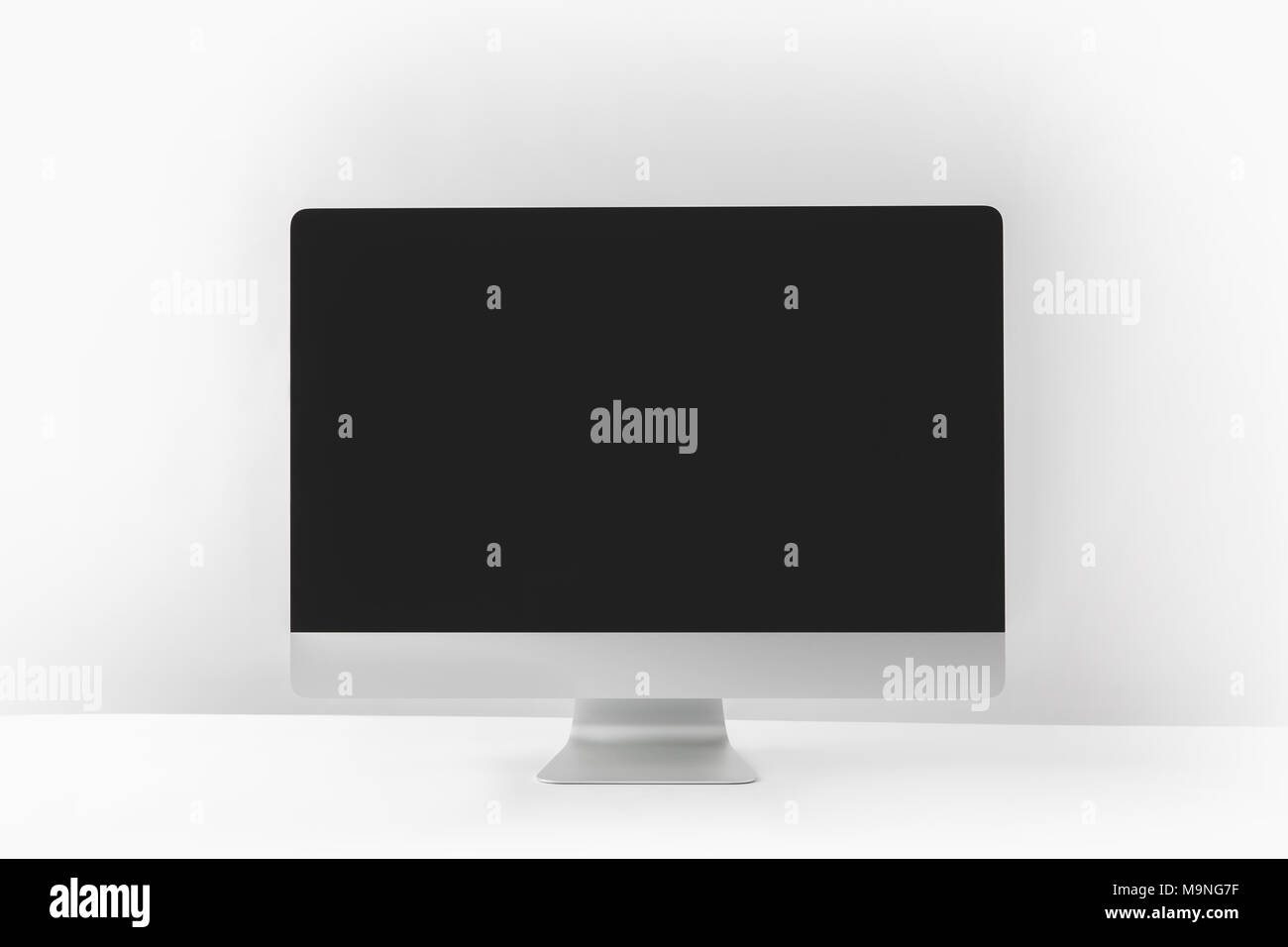 modern desktop computer with black screen on white Stock Photo - Alamy