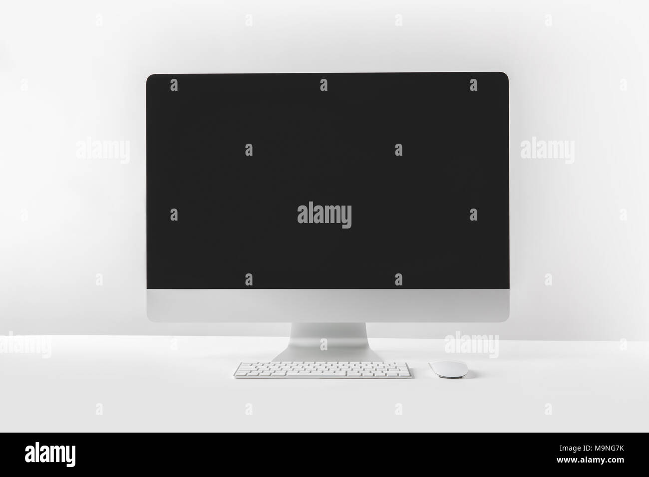 modern desktop computer with blank screen on white Stock Photo - Alamy