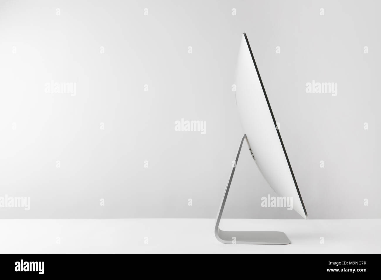 side view of modern desktop computer on white Stock Photo - Alamy