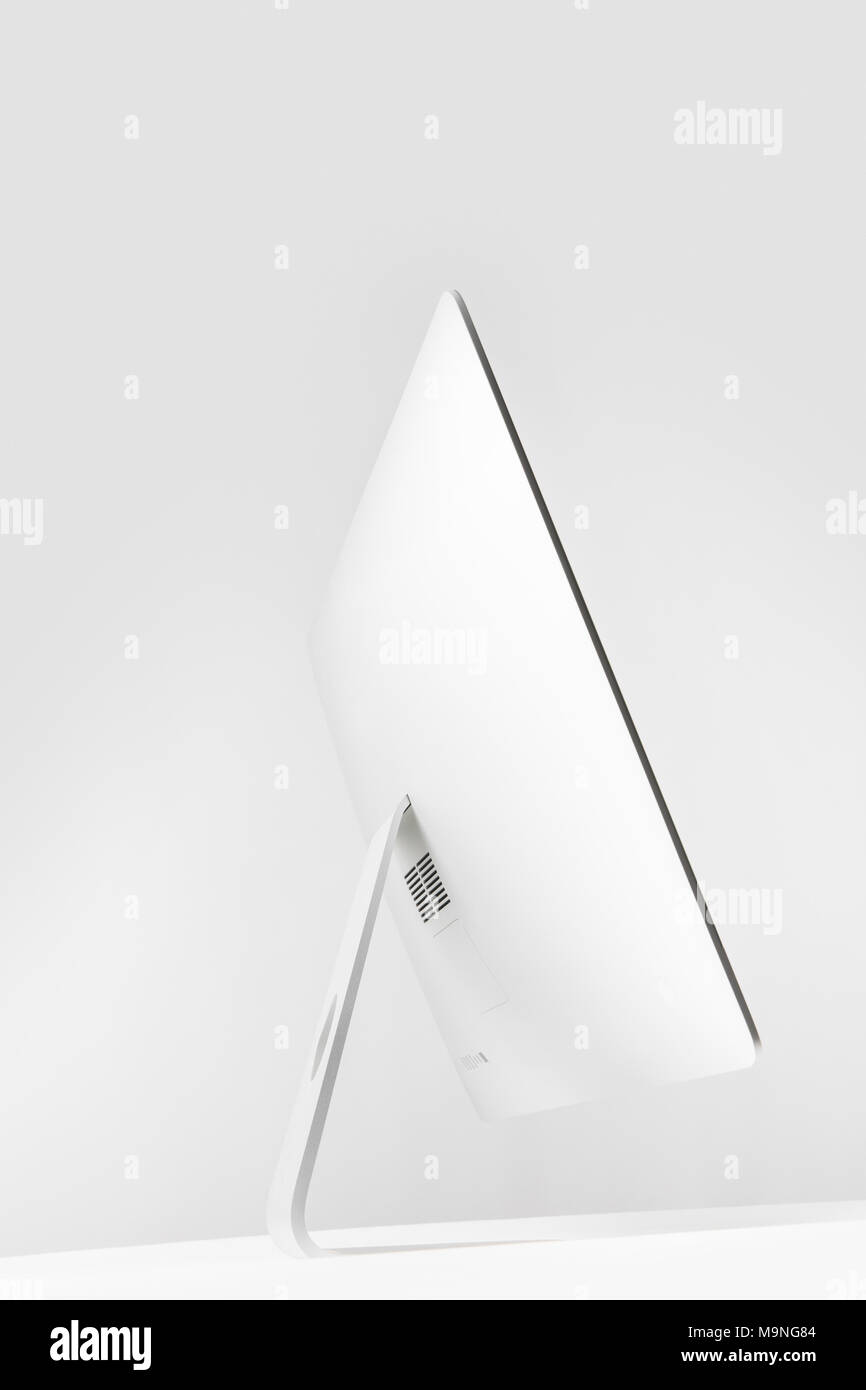 side view of desktop computer display on white Stock Photo - Alamy