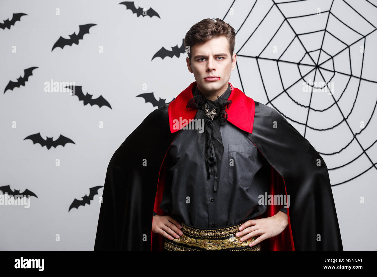 Vampire Halloween Concept - Portrait of handsome caucasian Vampire in ...