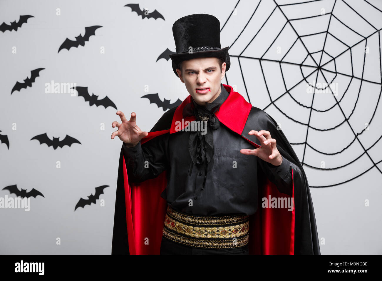 Angry vampire man blood fangs hi-res stock photography and images - Alamy