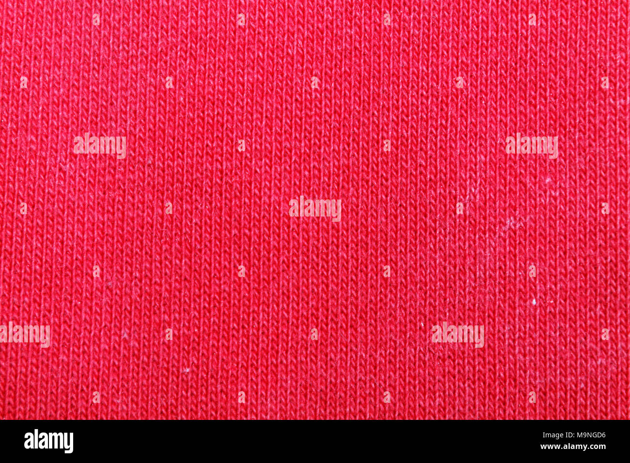Fabric red colored texture or background Stock Photo - Alamy